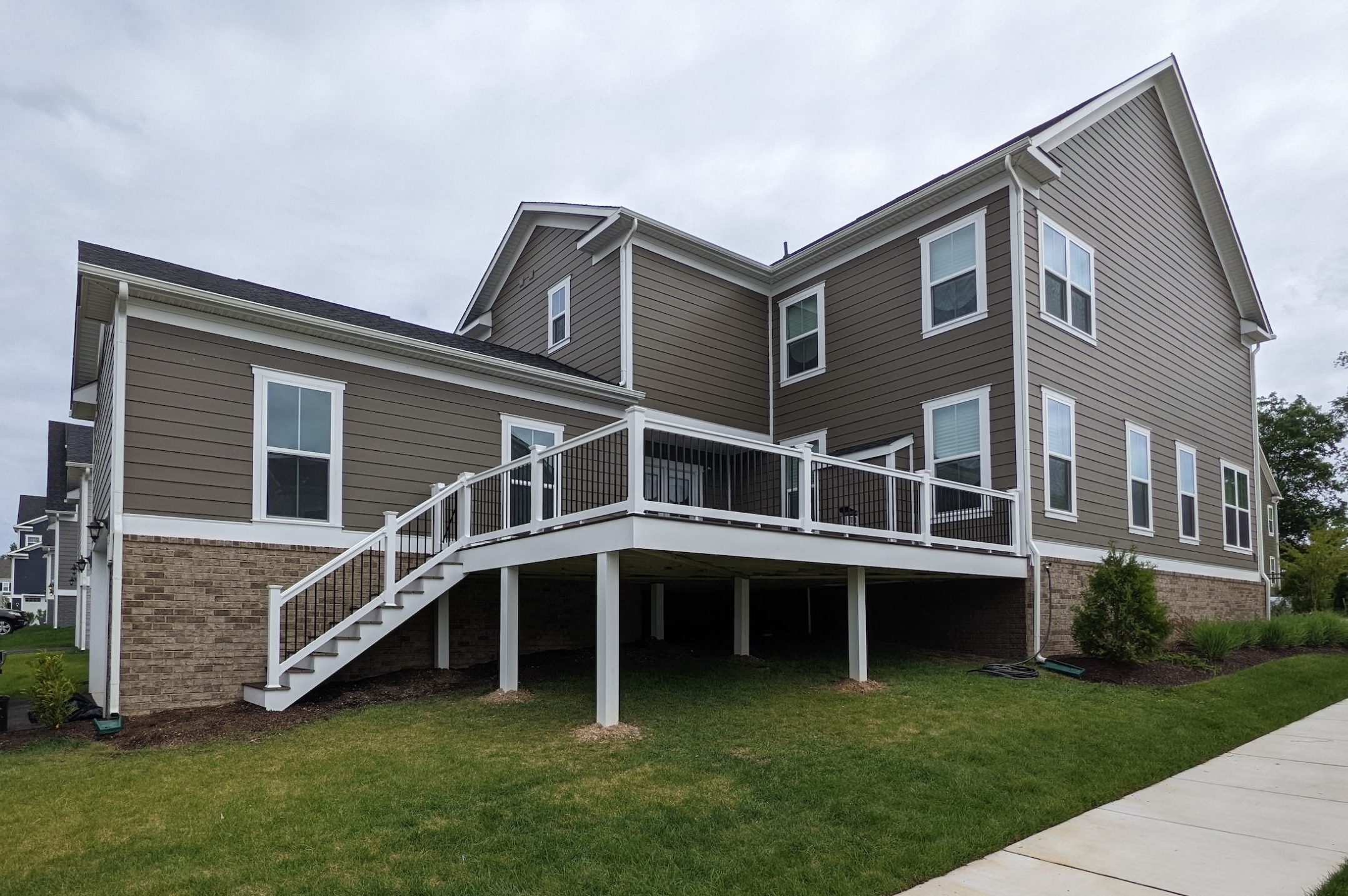 Makeover Monday: Trex Woodland Brown Deck in Middle River | Fence ...