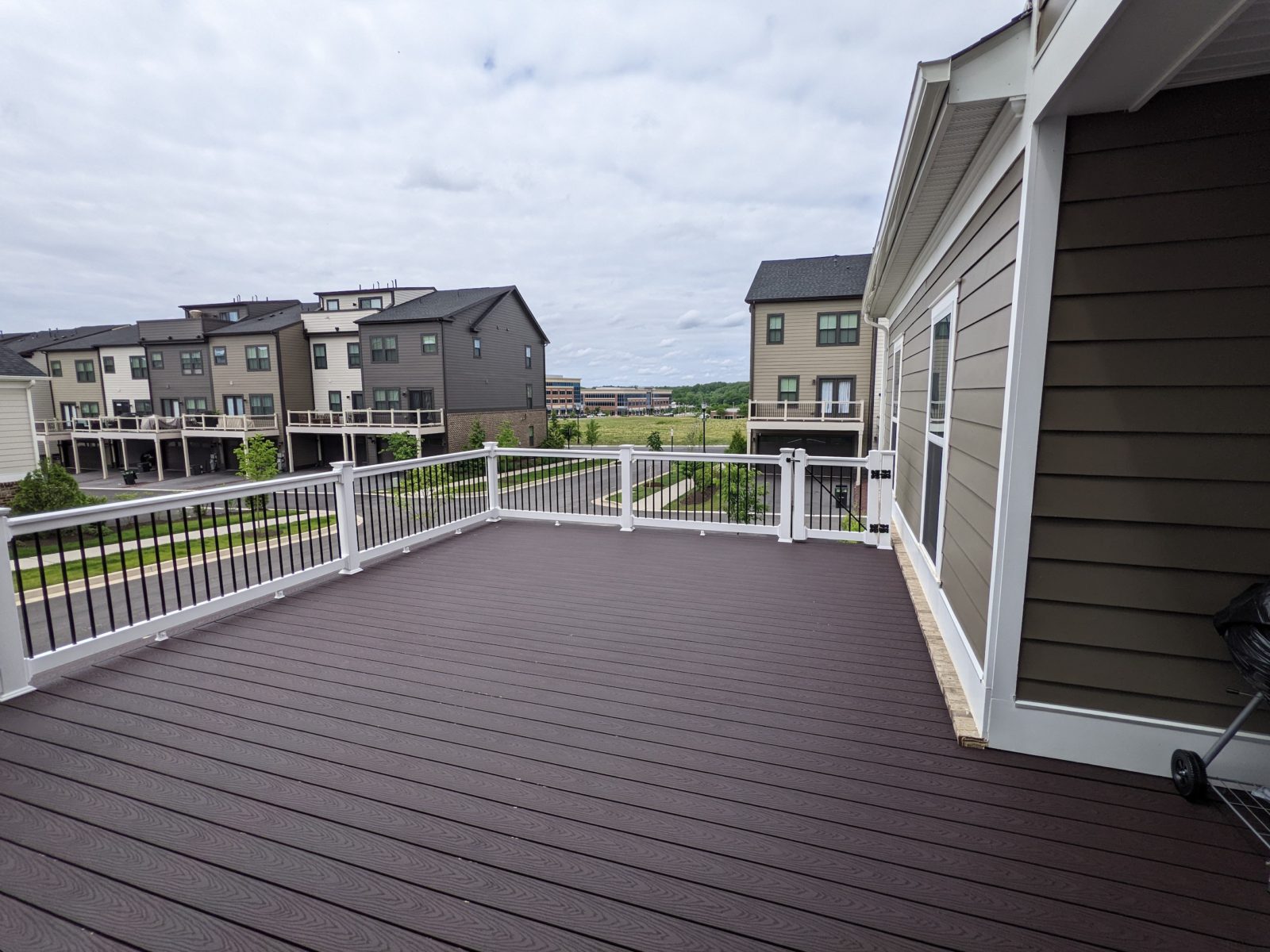 Makeover Monday: Trex Woodland Brown Deck in Middle River | Fence ...