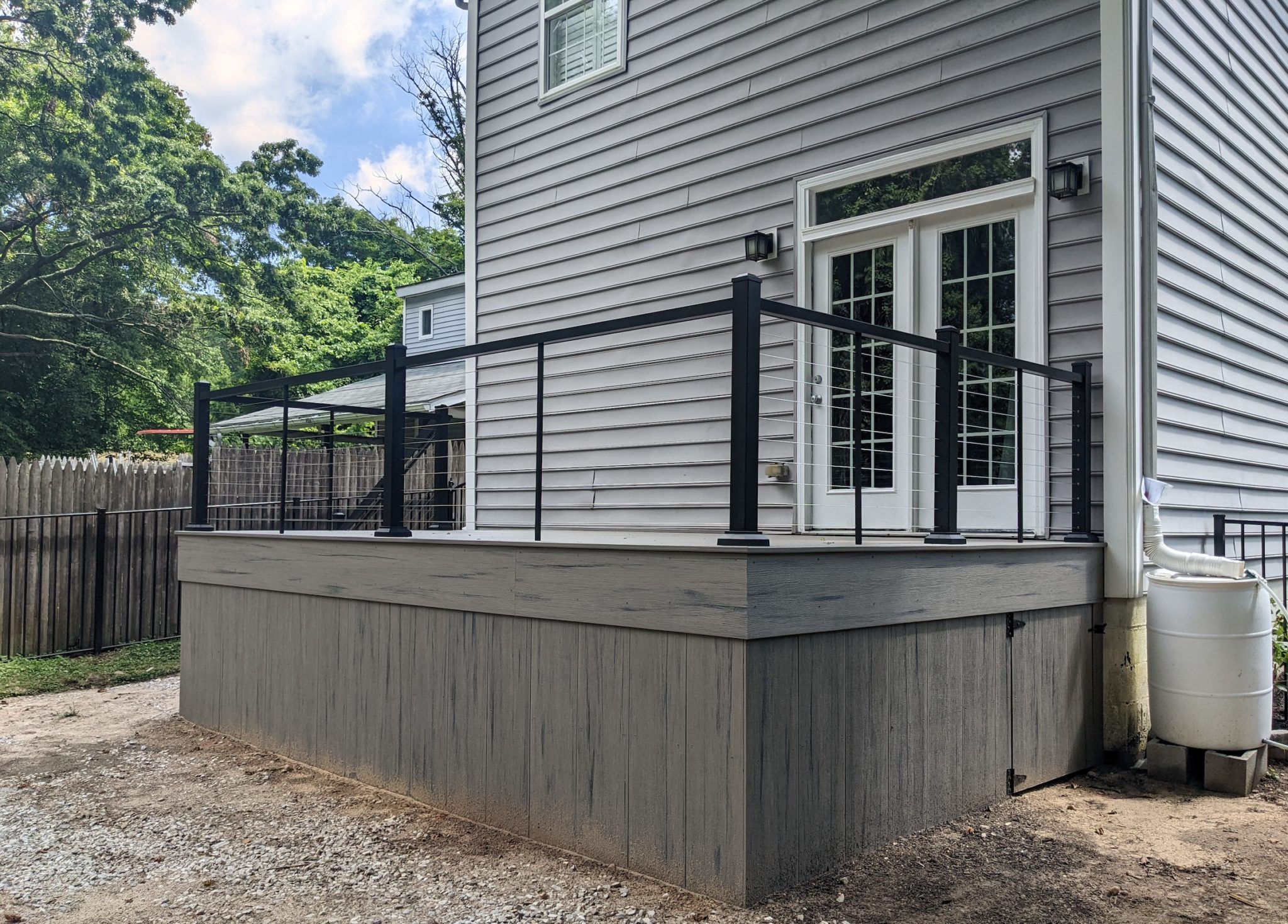 Makeover Monday: TimberTech Deck With Cable Railing in Parkville ...