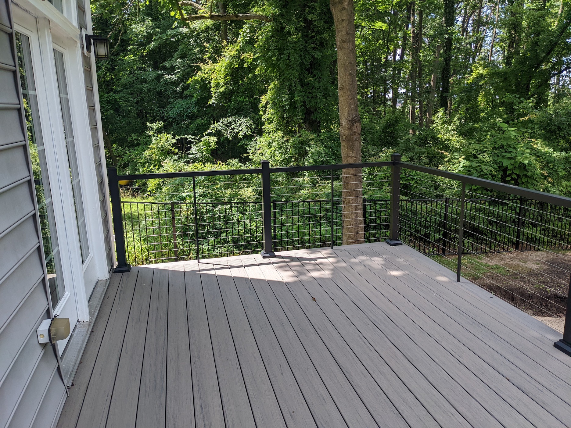 Makeover Monday: TimberTech Deck With Cable Railing in Parkville ...